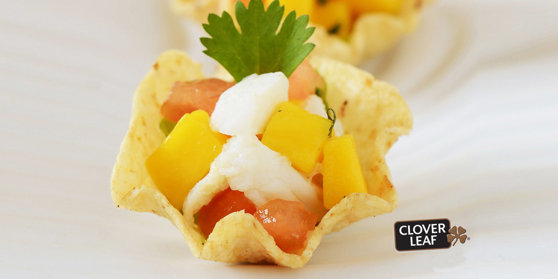 Corn Chips with Mango Salsa and Crabmeat - Clover Leaf